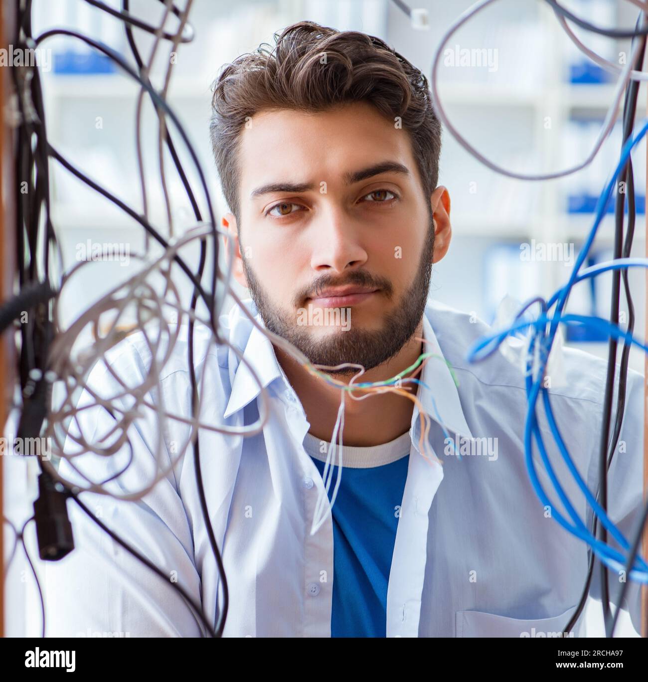 Electrician trying untangle wires hi-res stock photography and images ...