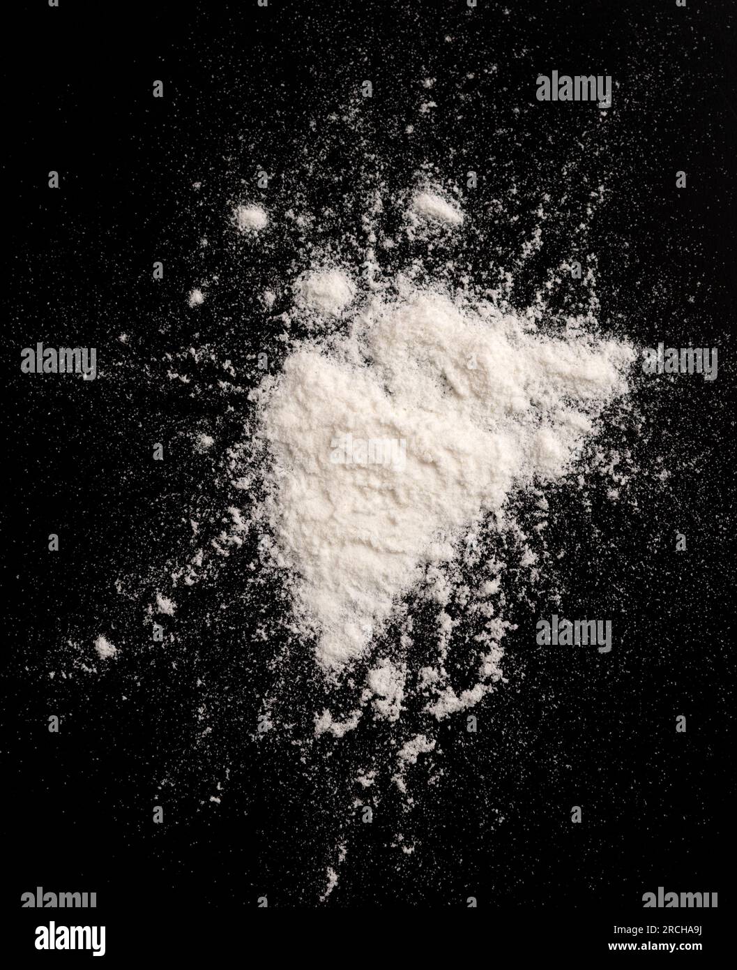 Wheat flour on black background Stock Photo - Alamy