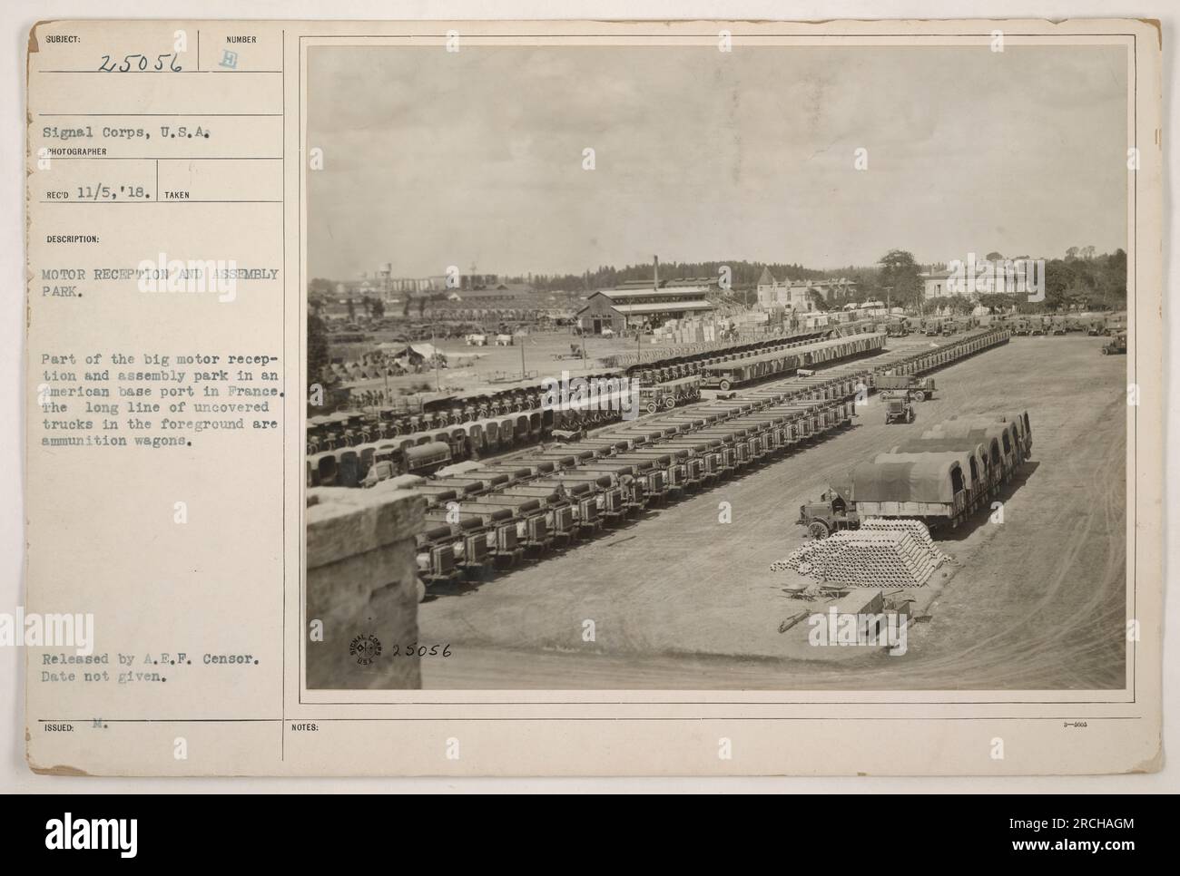 A line of uncovered ammunition wagons at a motor reception and assembly ...