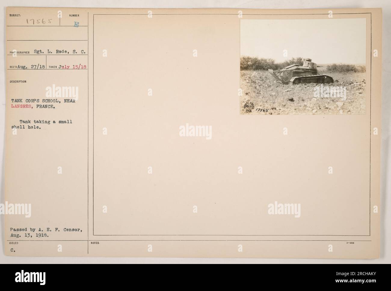 A tank at the Tank Corps School is seen taking a small shell hole, with ...