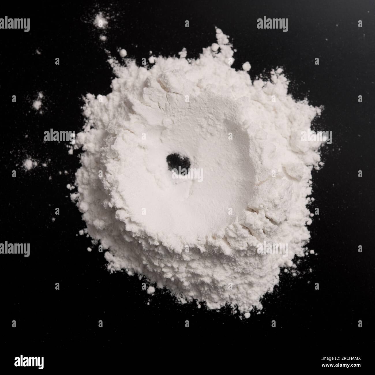 Wheat flour on black background Stock Photo - Alamy