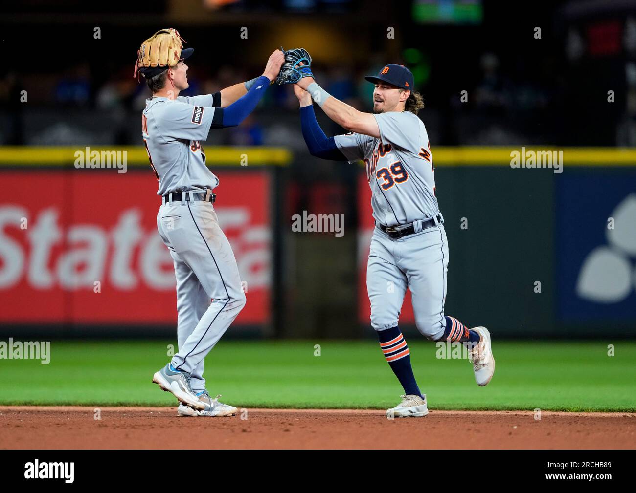 Detroit Tigers second baseman Nick Maton, left, greets Zach McKinstry ...