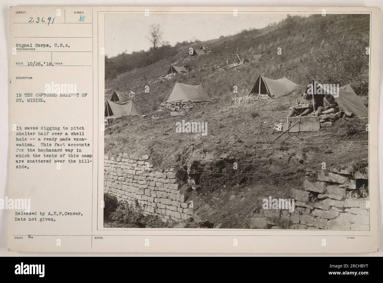 Soldiers of the Signal Corps of the U.S.A set up camp in the captured ...
