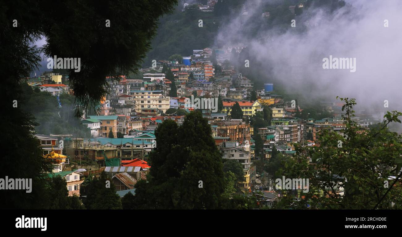 panoramic view of misty and cloudy darjeeling hill station and himalaya ...