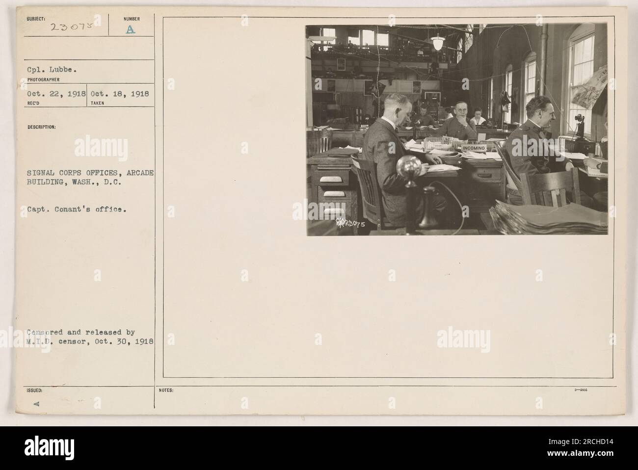 A photograph of Cpl. Lubbe in Capt. Conant's office at the Signal Corps ...