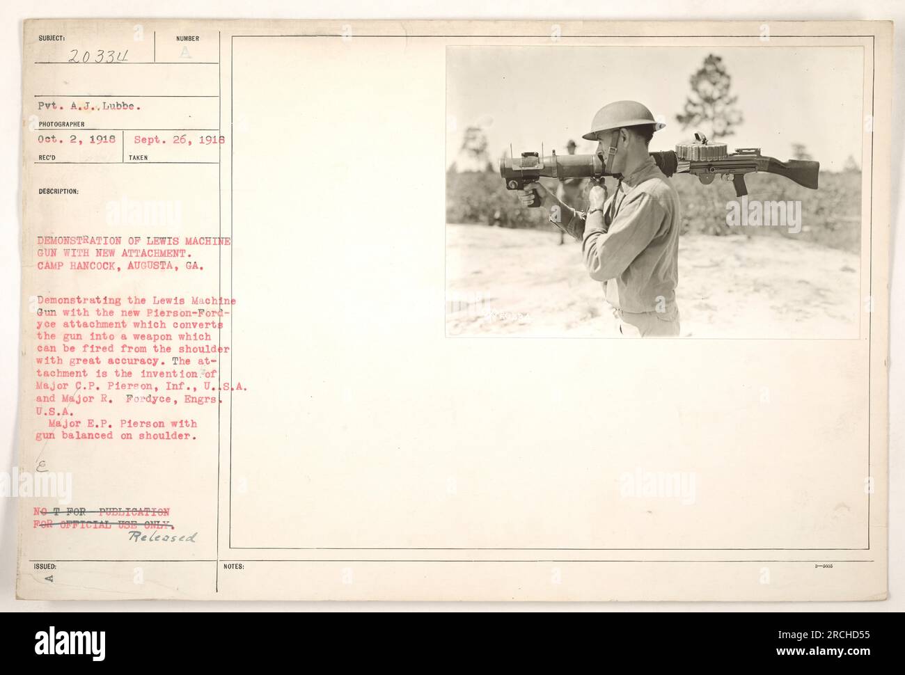Pvt. A.J. Lubbe is seen demonstrating the Lewis Machine Gun with a new ...