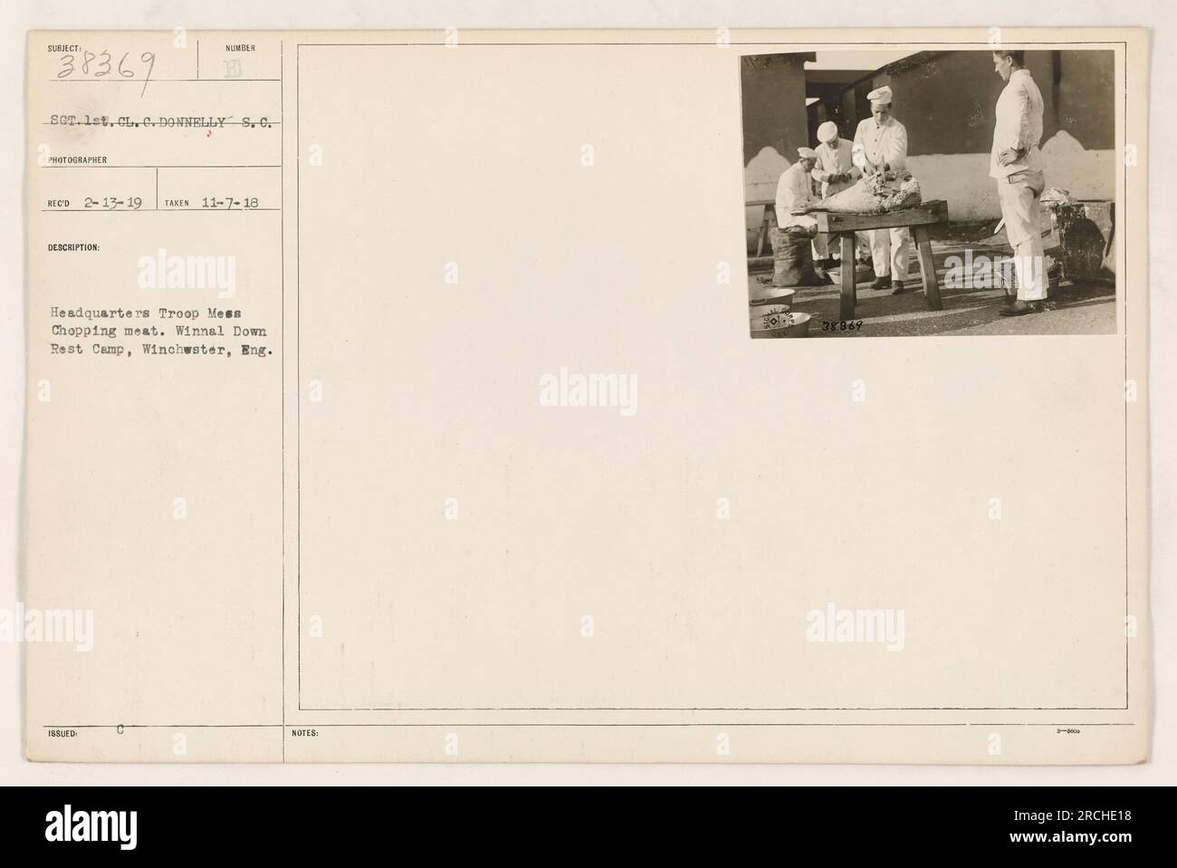 Soldier cutting meat at Headquarters Troop Mess in Winnal Down Rest ...