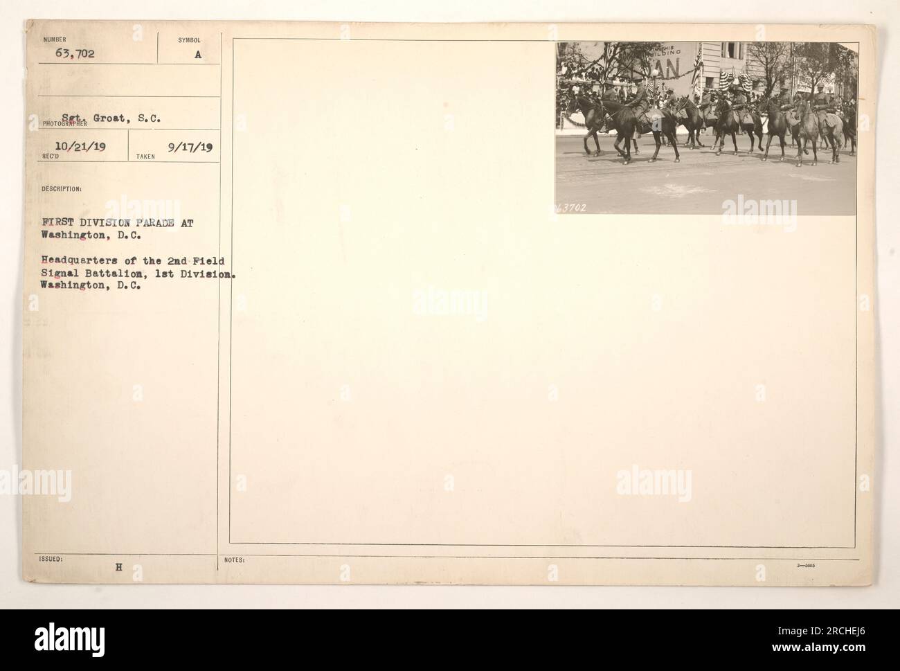 Members of the First Division parade through Washington, D.C., led by ...