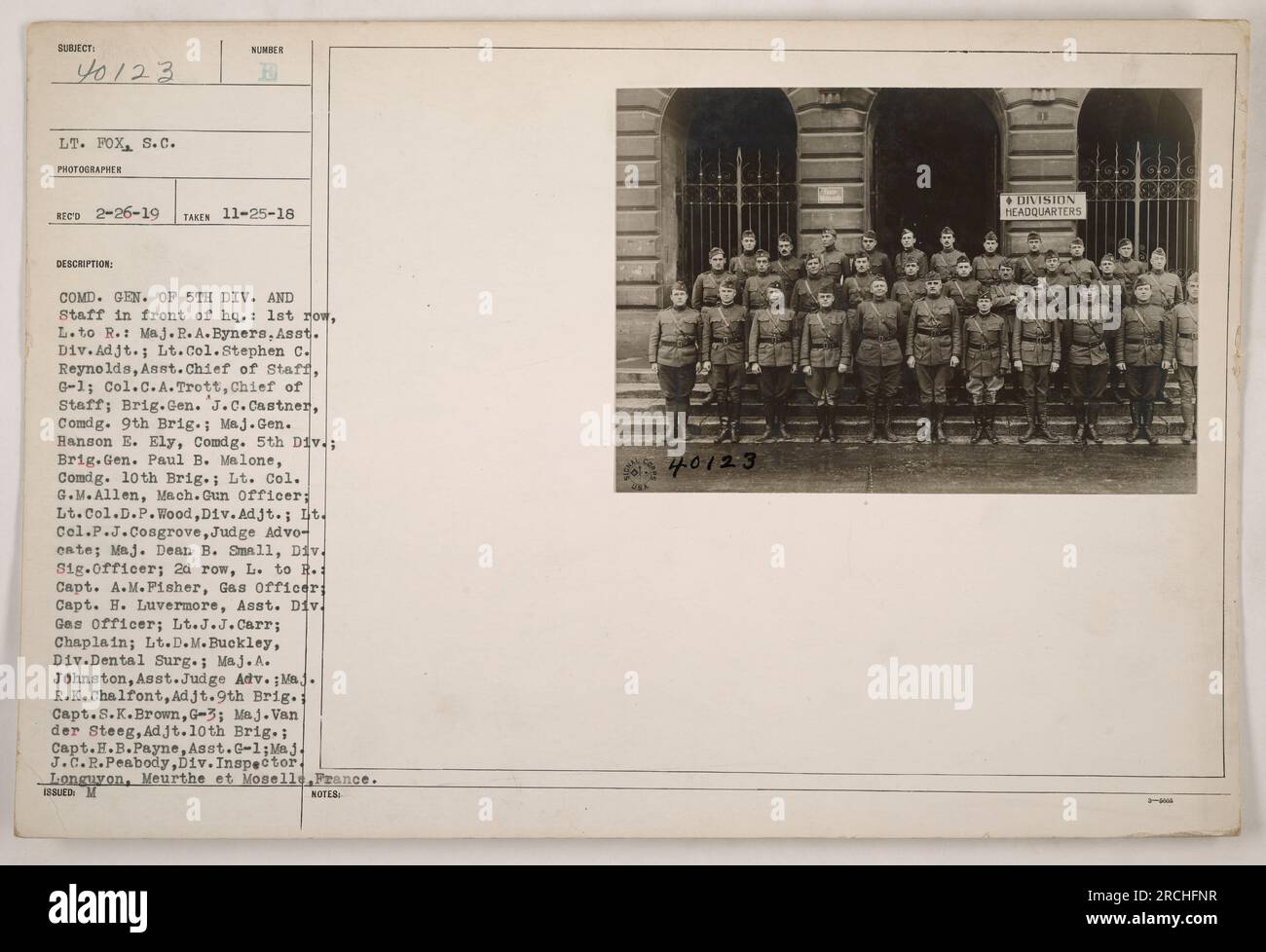 Caption: Lt. Fox, S.C., photographed Lt. Gen. Ely and the staff of the ...