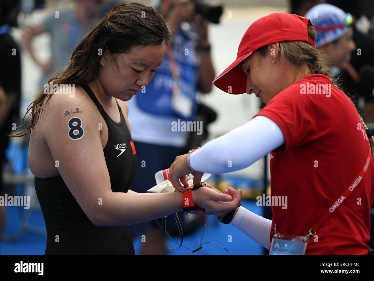 Fukuoka, Japan. 15th July, 2023. Sun Jiake (L) of China reacts after ...