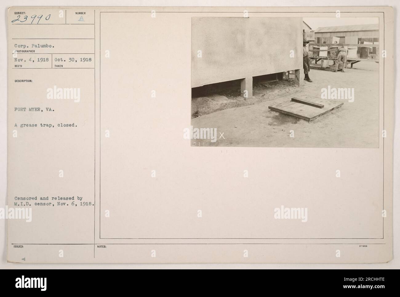 Soldier observing a closed grease trap at Fort Myer, Virginia during ...