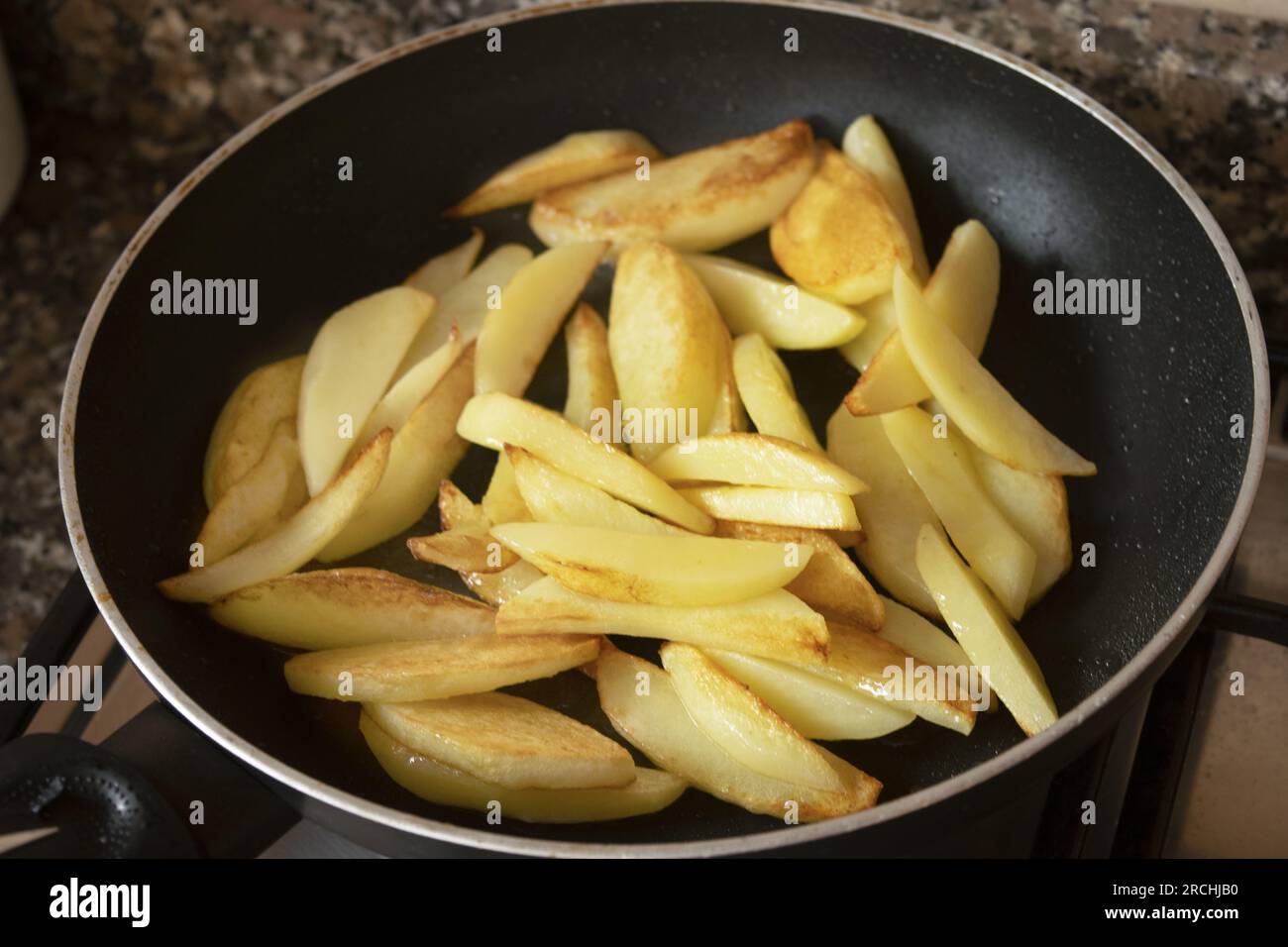 homemade fries in a pan Stock Photo - Alamy