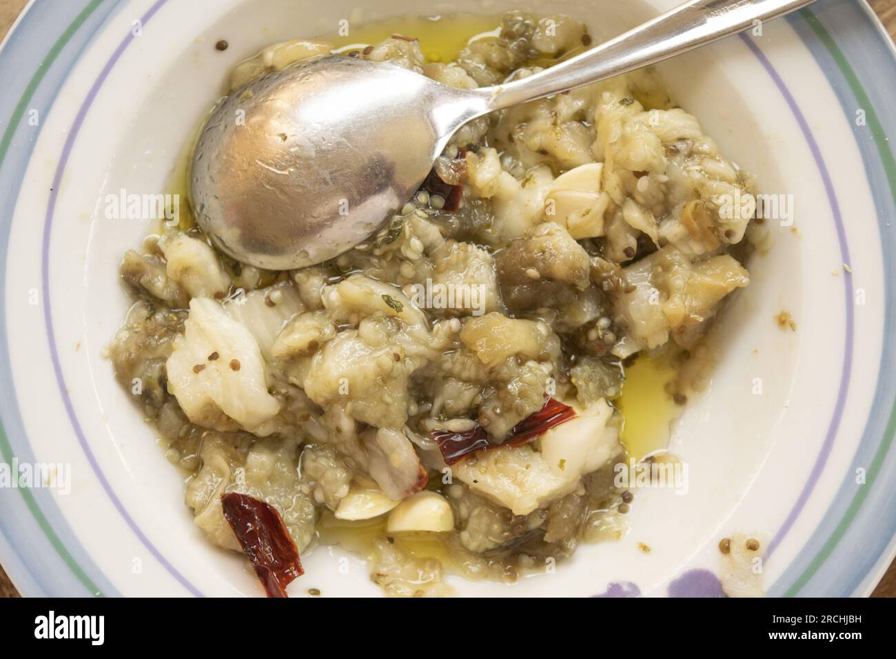 roasted aubergine pulp with olive oil garlic and pepper Stock Photo - Alamy
