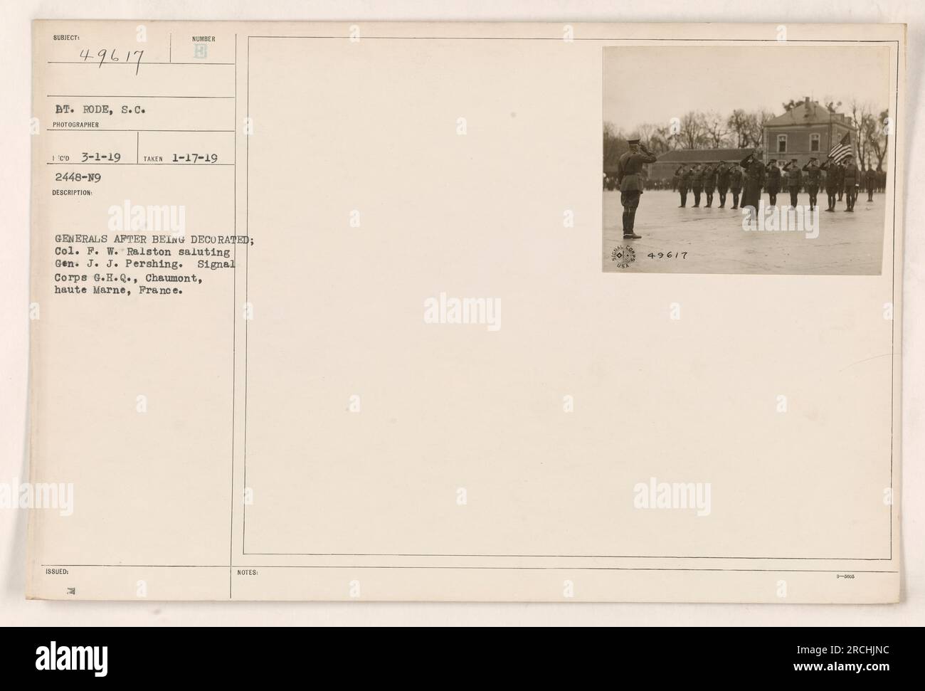 Colonel F. W. Ralston salutes General J. J. Pershing after both receive ...