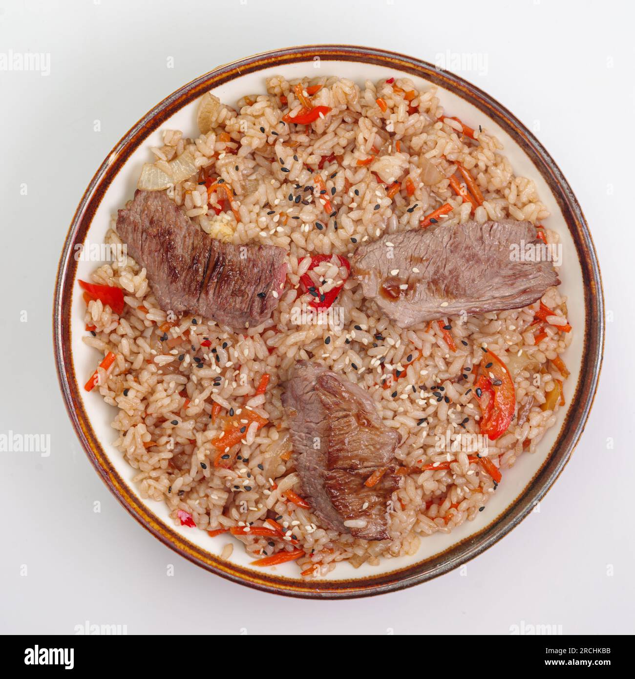 Fried rice with beef and vegetables isolated on white background ...