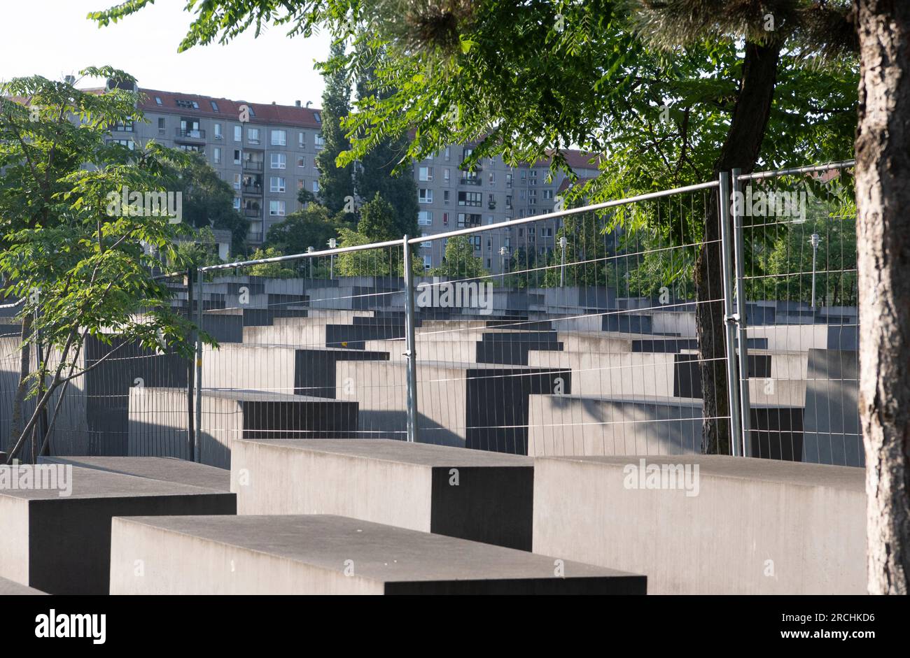 Berlin, Germany. 15th July, 2023. A construction fence borders part of ...