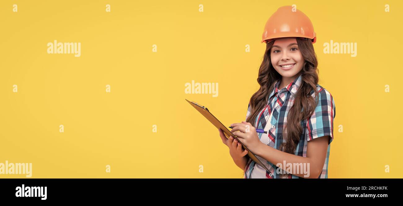 signing a contract. on construction site. future engineer hold clipboard. safety work expertise ...