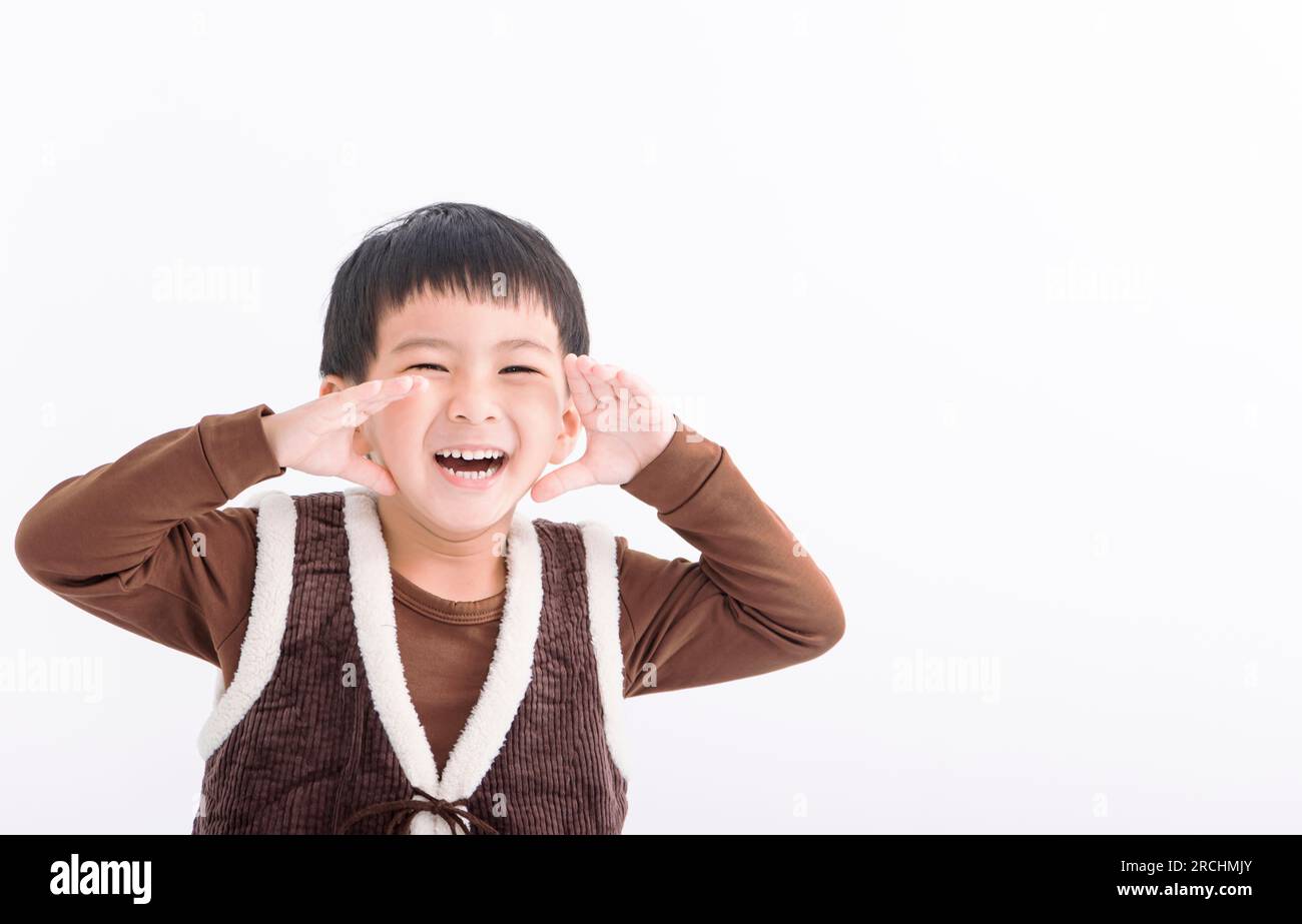 Boy child call somebody hold hands near face Stock Photo - Alamy