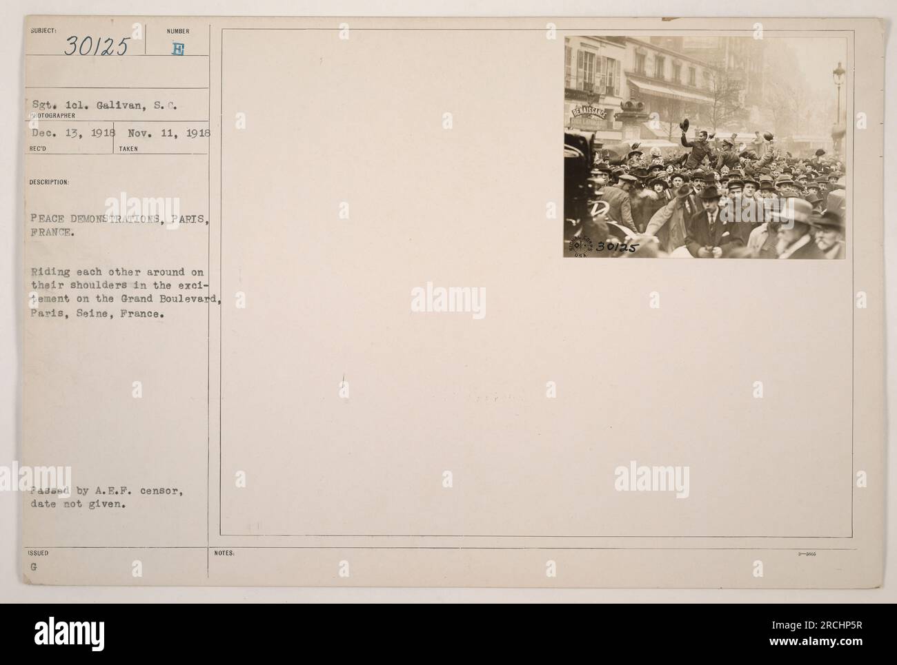 Soldiers celebrating the end of World War I in Paris, France. They can ...