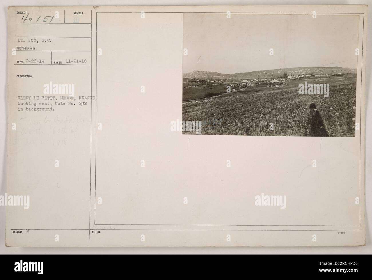 American soldier stands at attention in front of Cote No. 292 at Clery ...