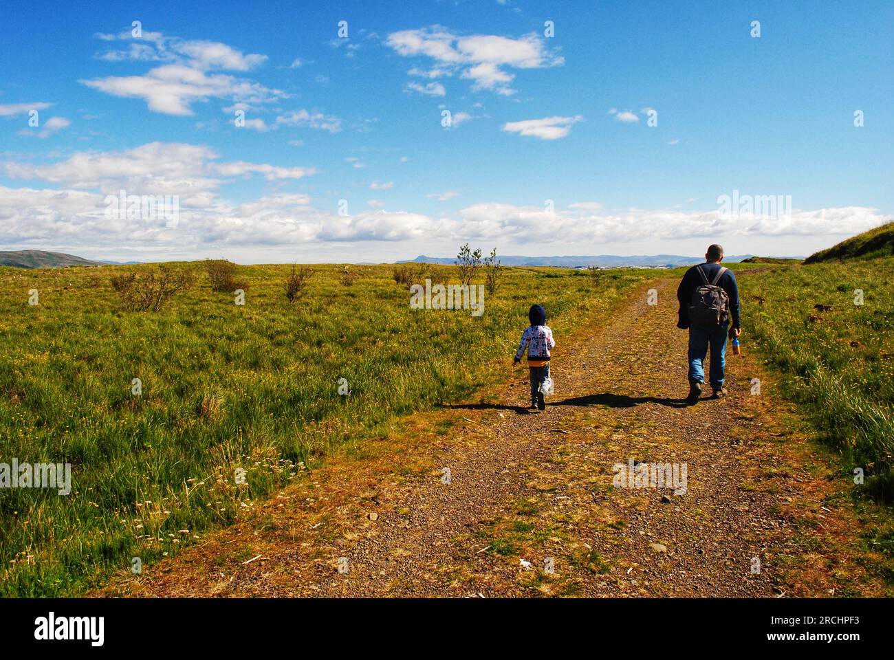 Father and son go on a hike on Videy Island, Iceland Stock Photo - Alamy