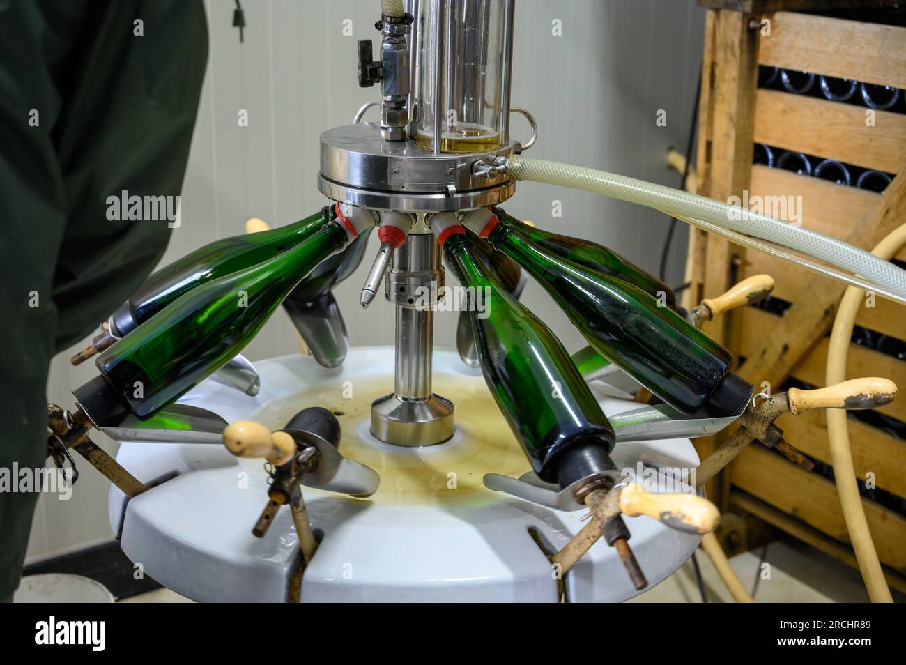 Disgorgement and adding sweet liquor procedure, traditional way of ...
