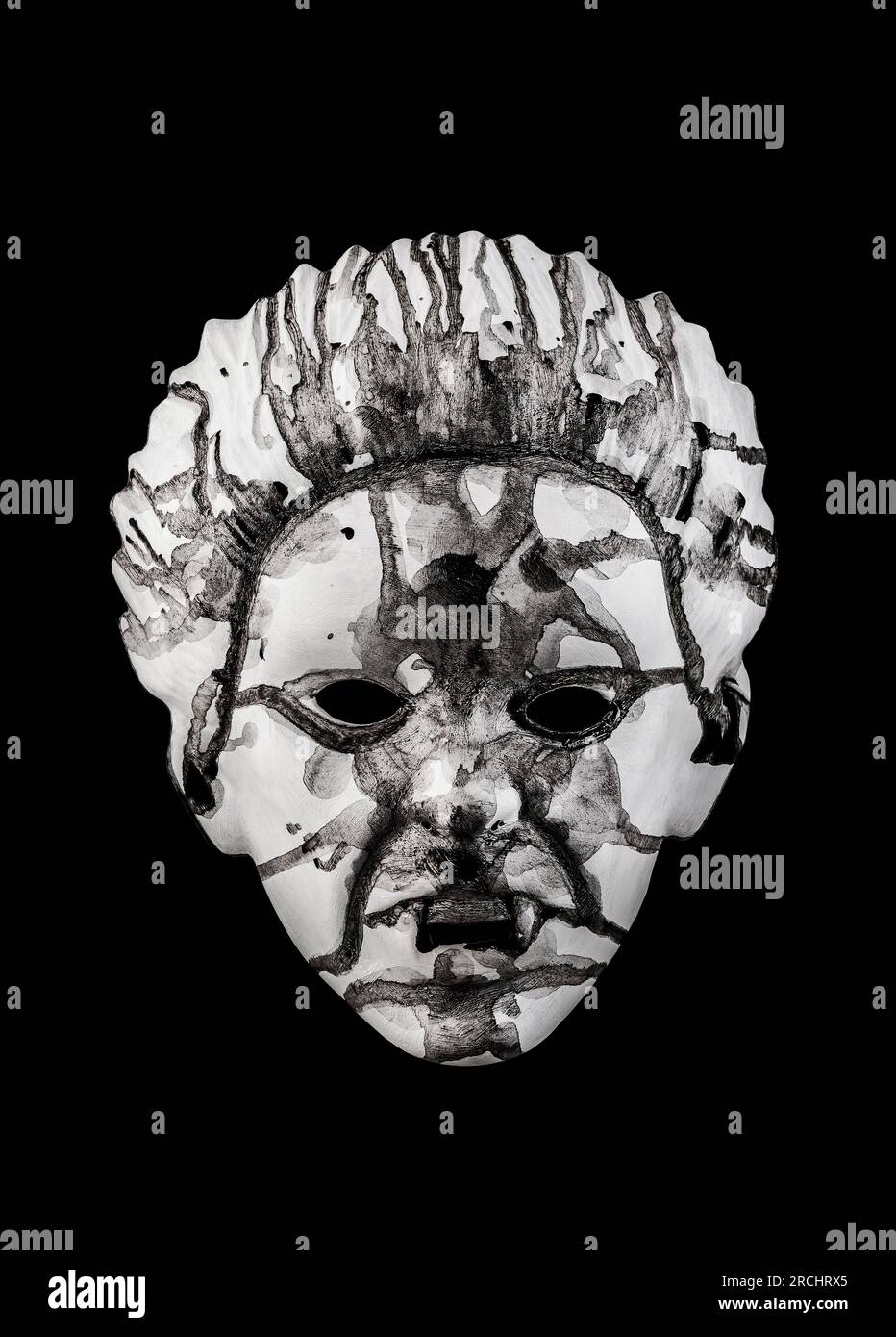 Scary white head painted black isolated on black background Stock Photo ...