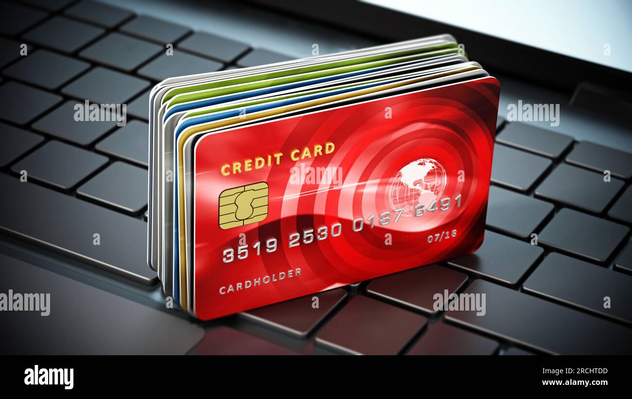 Credit cards standing on laptop computer keyboard. 3D illustration ...