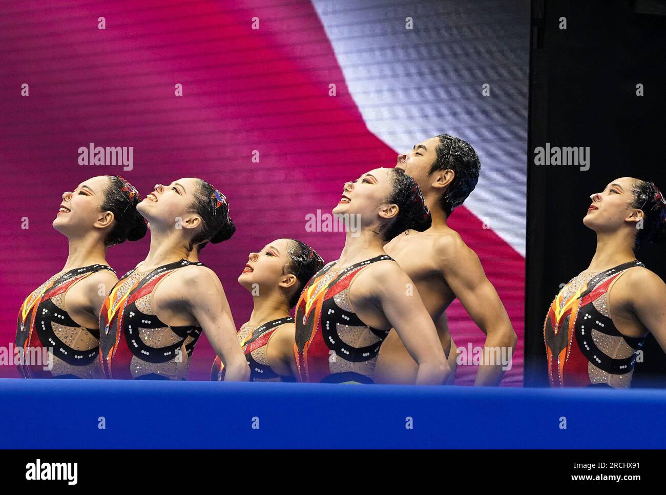 Japan artistic swimming team members pose before performing in the ...