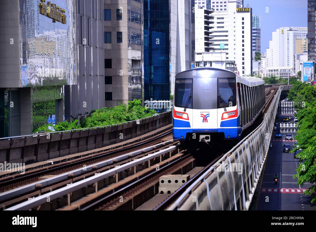 A BTS Skytrain arrives at Sala Daeng station on the Silom line in Bang ...