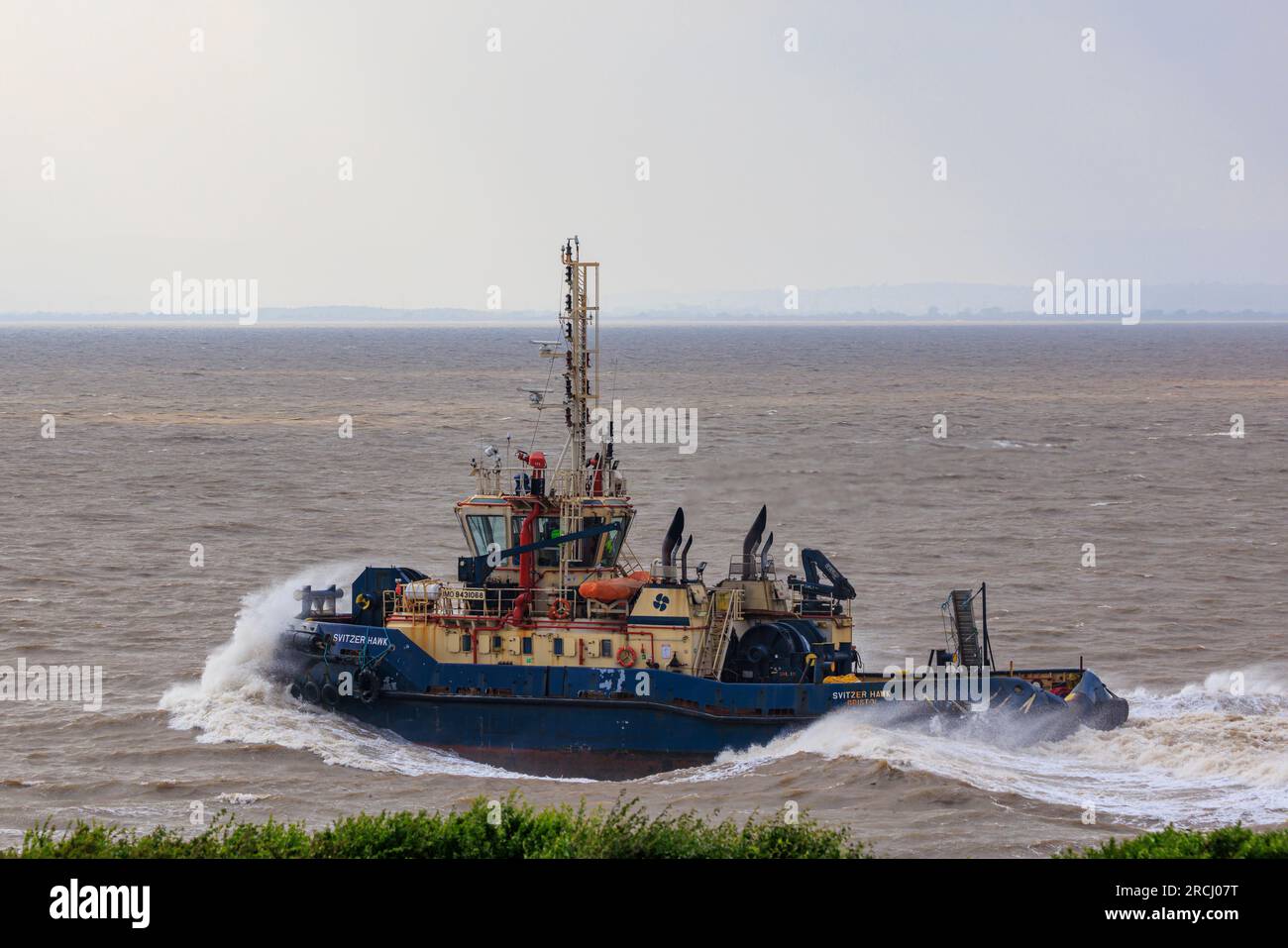 Bow wave hitting Svitzer Hawk Stock Photo - Alamy