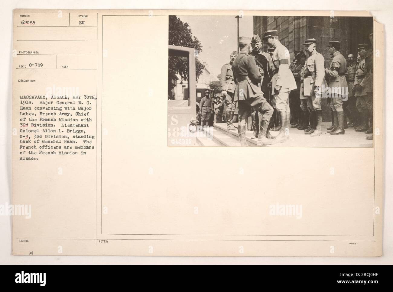 Major General W.G. Haan converses with French Major Lobez, who is the ...