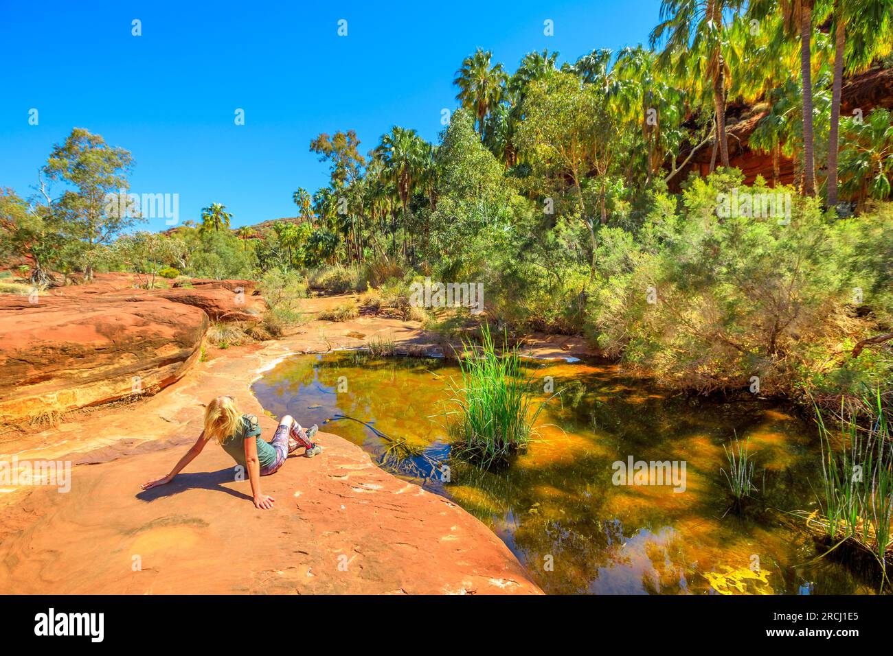 Tourist woman relaxing after trekking along Arankaia Walk in the heart ...