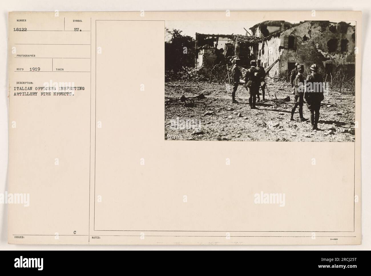 Italian officers inspect artillery fire effects during World War One ...