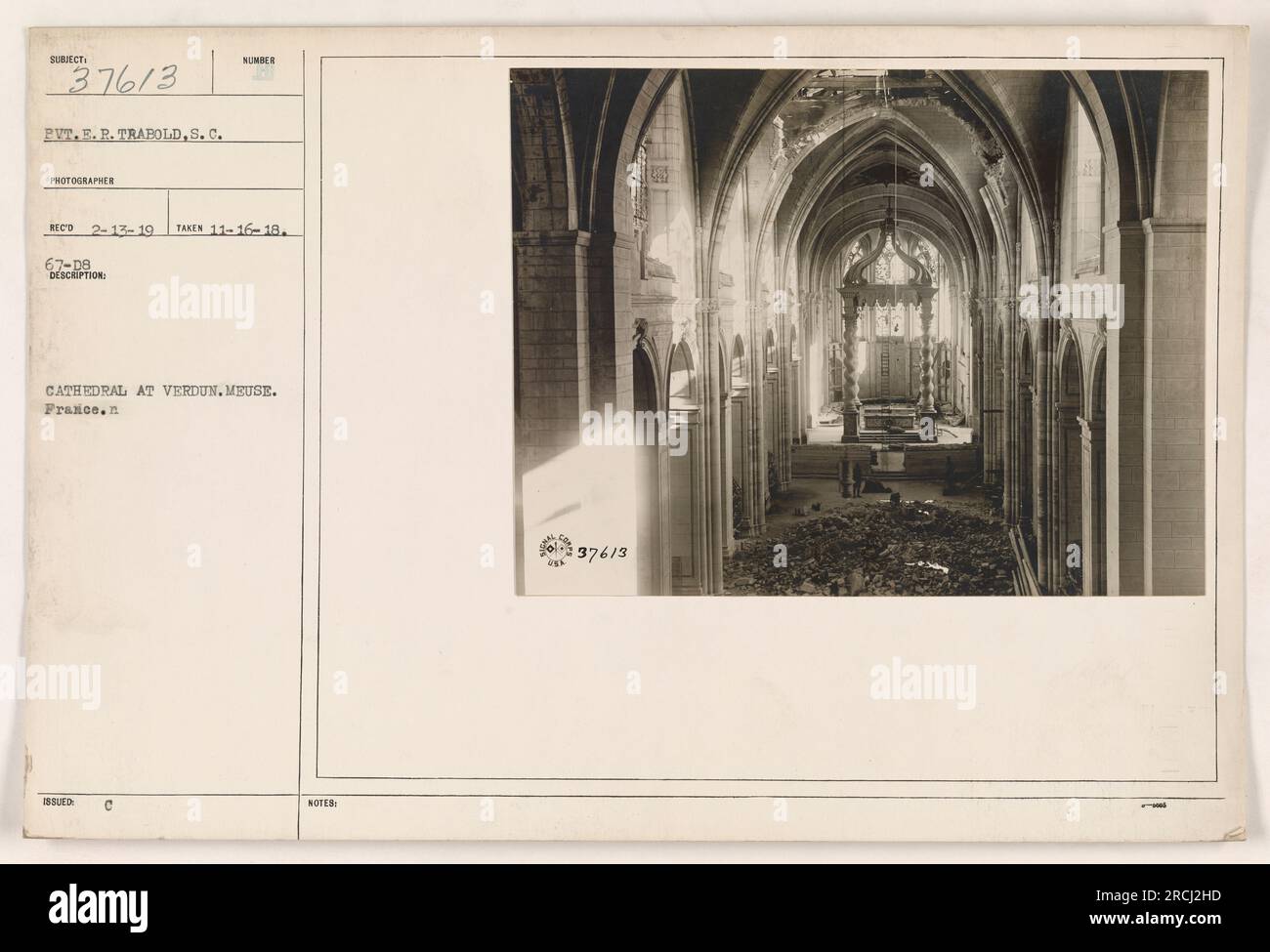 PVT. E.P. Trabold, an American soldier, takes a photograph on November ...