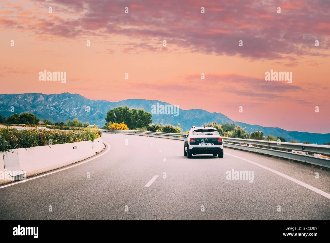 Citroen C4 Cactus Car Goes On Highway Road On Background Of Spanish ...