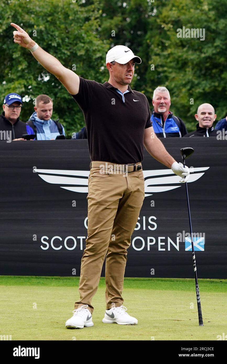 Rory McIlroy reacts and signals fore right after teeing off on the 4th ...