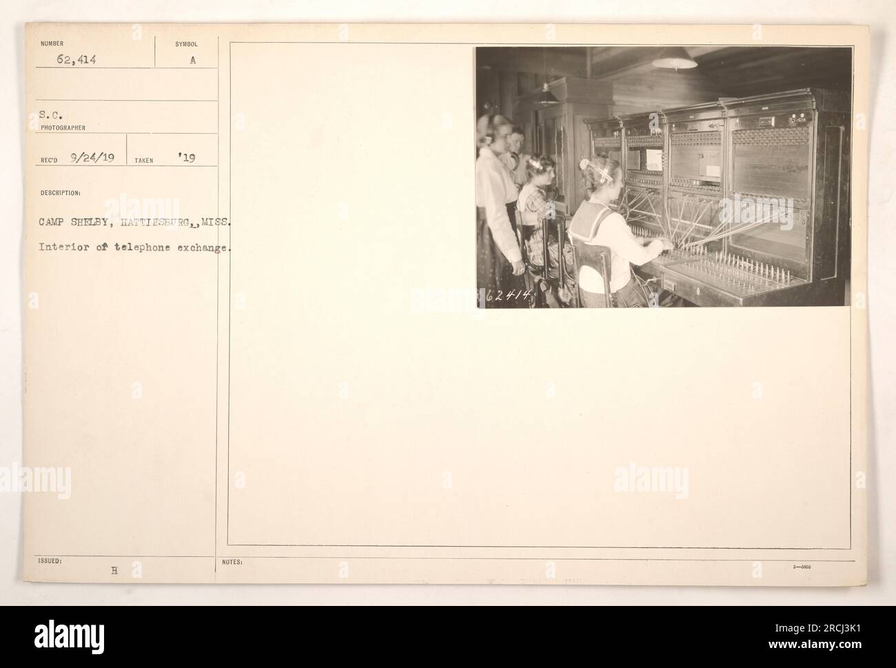 The photograph shows the interior of the telephone exchange at Camp ...