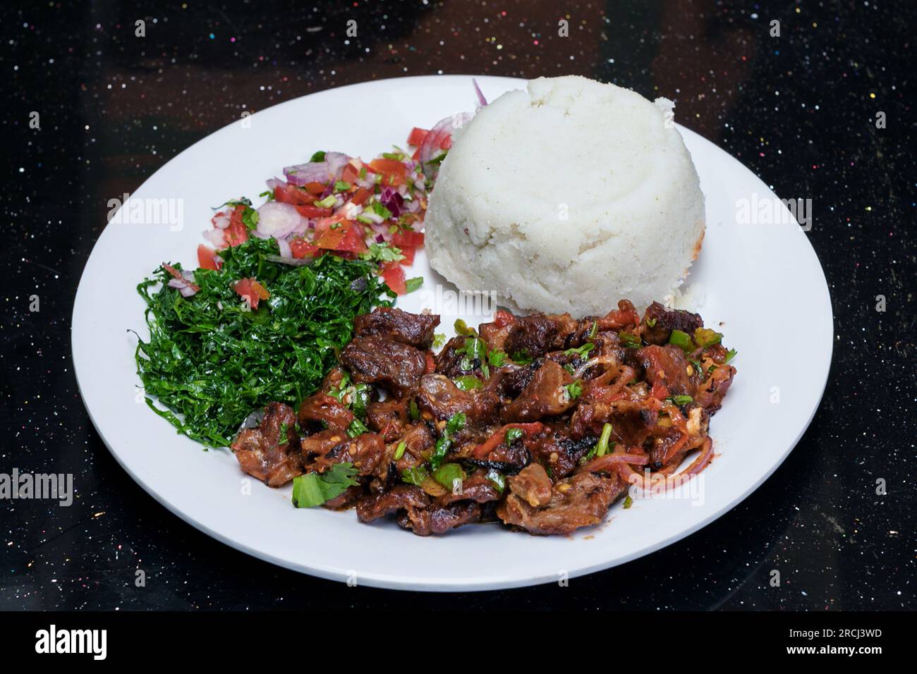 Kenyan cuisine includes ugali, chapati, githeri, goat, Nyama Choma, stews, samosas and sukuma ...