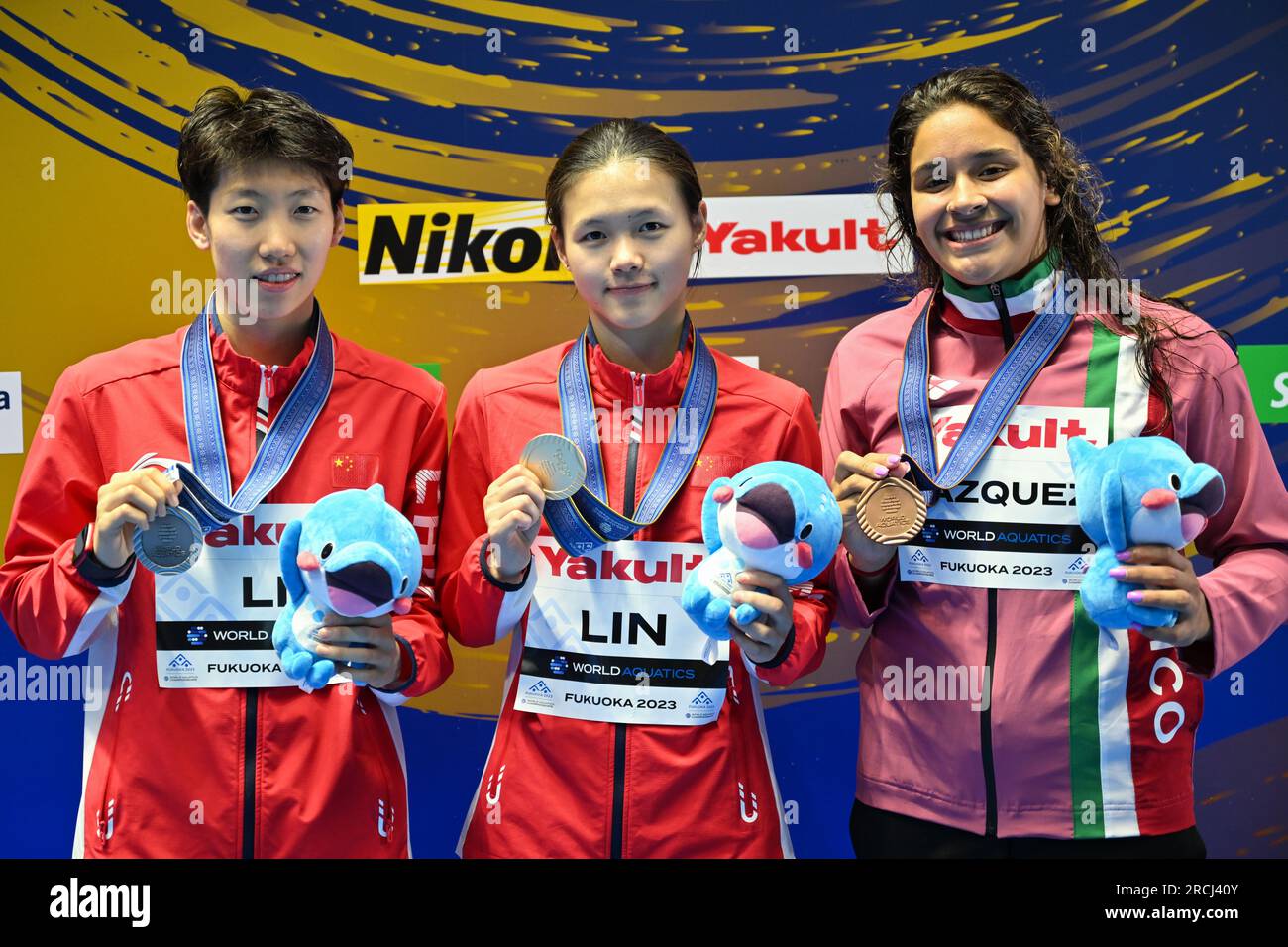 Fukuoka, Japan. 15th July, 2023. Gold medalist Lin Shan (C) of China ...