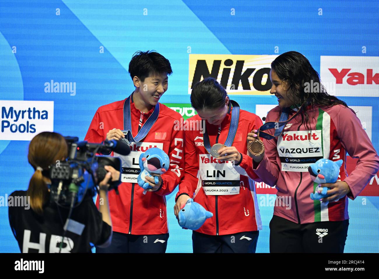 Fukuoka, Japan. 15th July, 2023. Gold medalist Lin Shan (C) of China ...