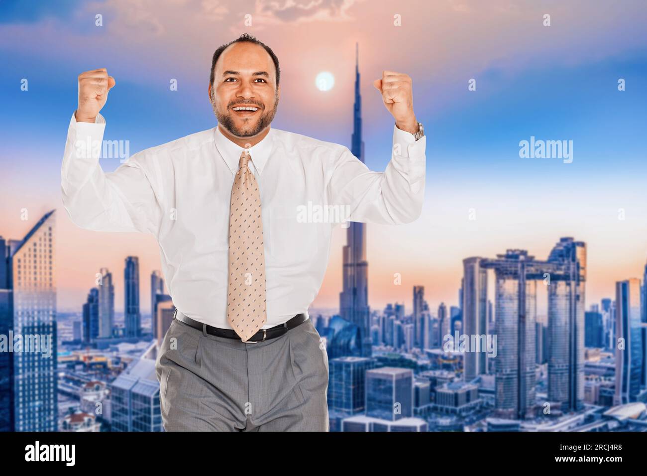 happy arab man winning in real estate business in Dubai Stock Photo - Alamy