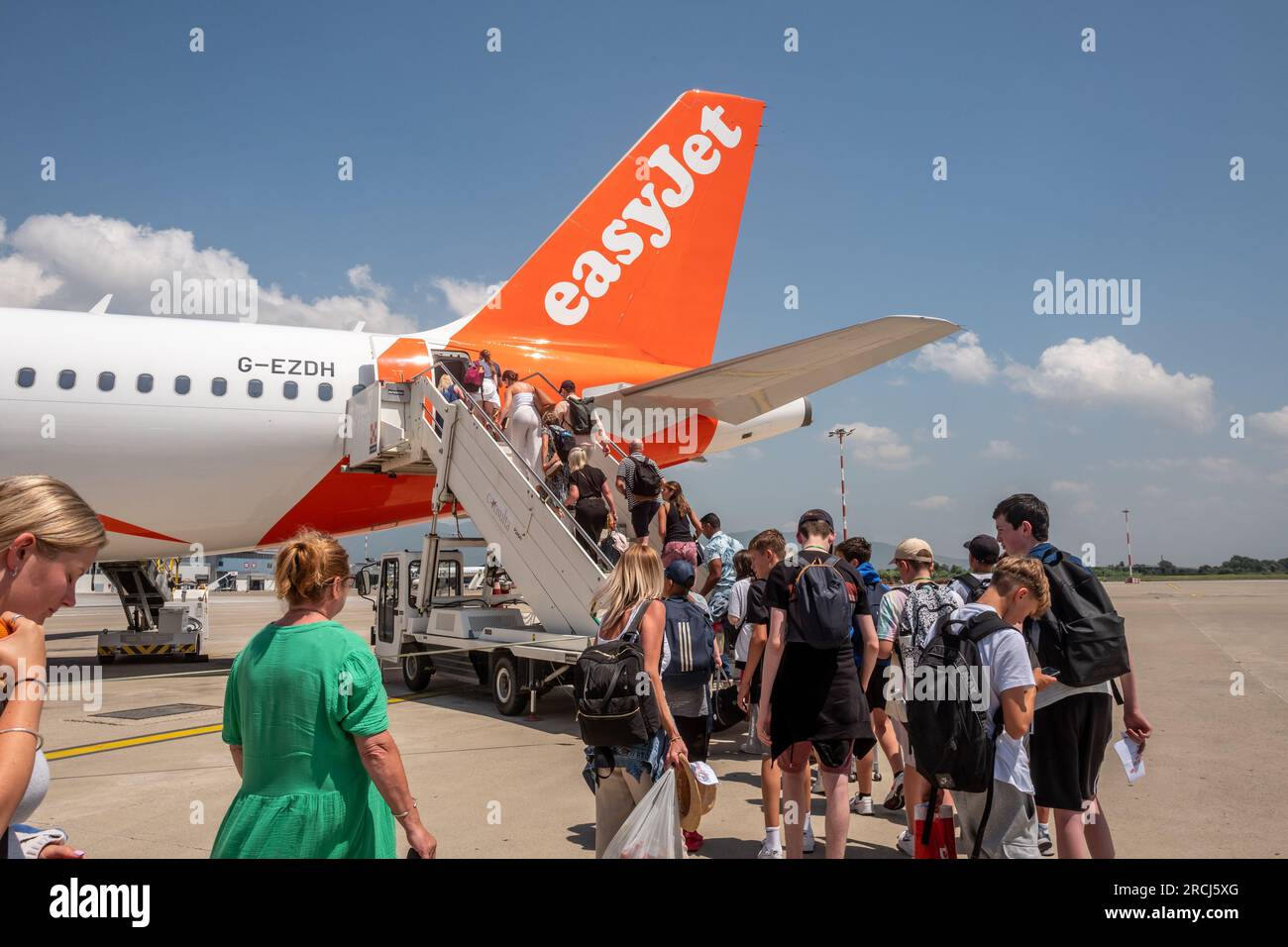 Pisa, July 14th 2023: Passengers boarding an EasyJet plane Stock Photo ...