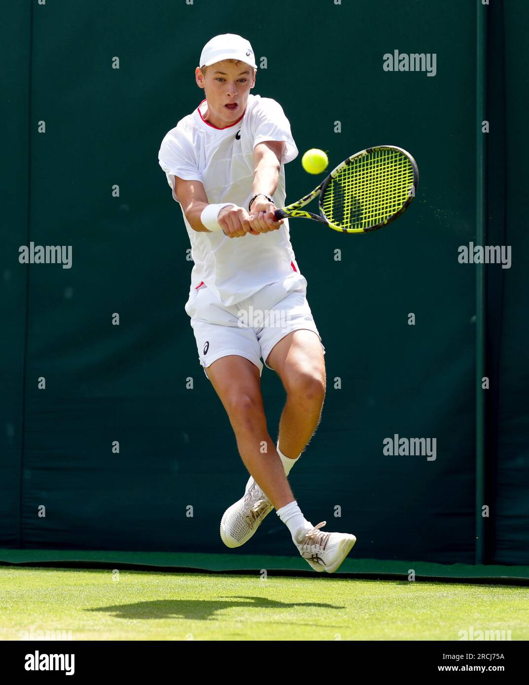 Cooper Williams in action against Henry Searle during the Boys' Singles ...