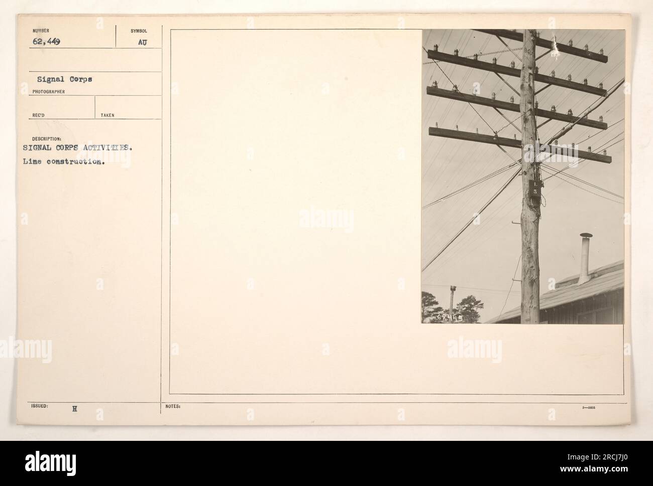Signal Corps soldiers constructing communication lines during World War ...