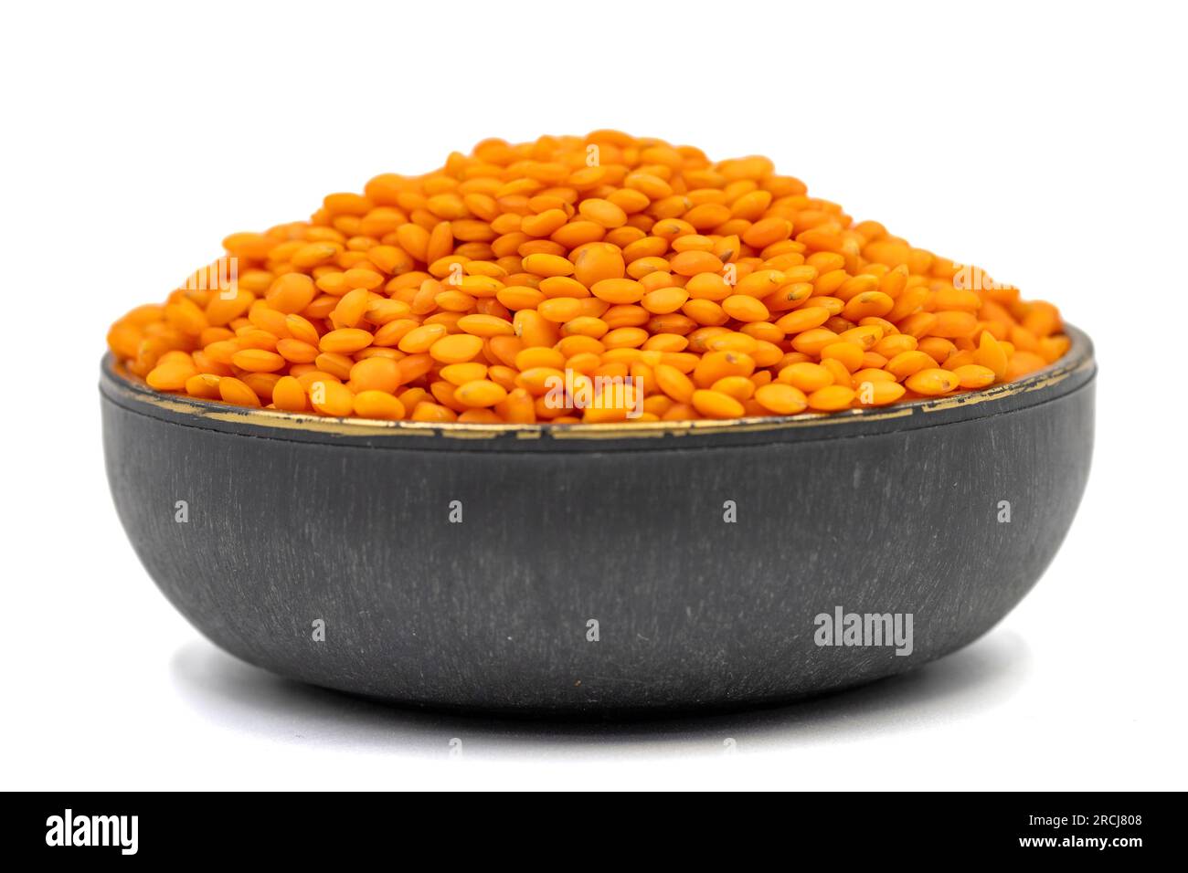 Red lentils isolated on white background. Raw red lentils in bowl. Close up Stock Photo - Alamy