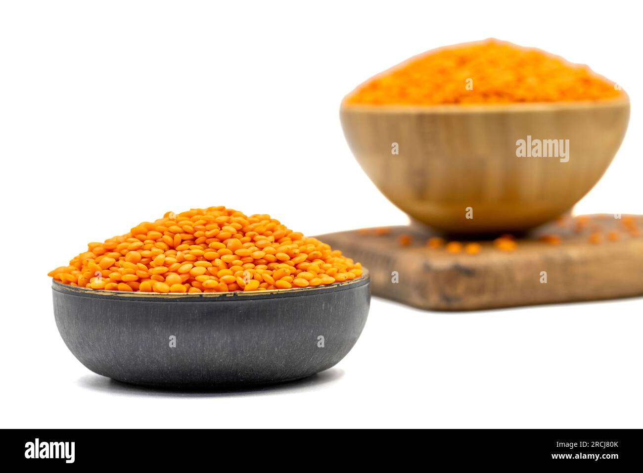 Red lentils isolated on white background. Raw red lentils in bowl Stock Photo - Alamy