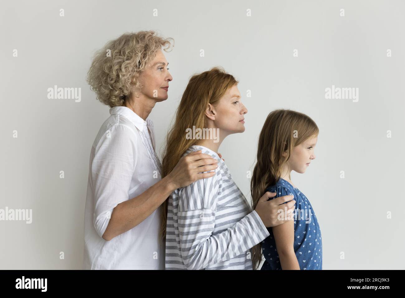 Girls and women of three female generations side portrait Stock Photo ...