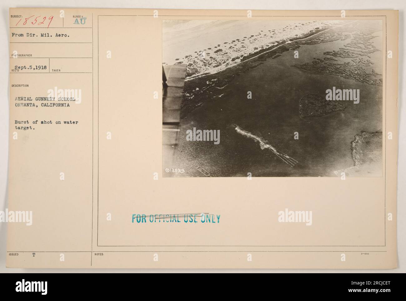 Aerial gunnery practice at Oneanta, California. A burst of shot hits a ...