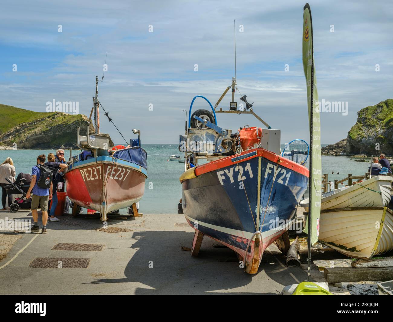 On a summer's day, the small fishing boats that line the slipway at ...